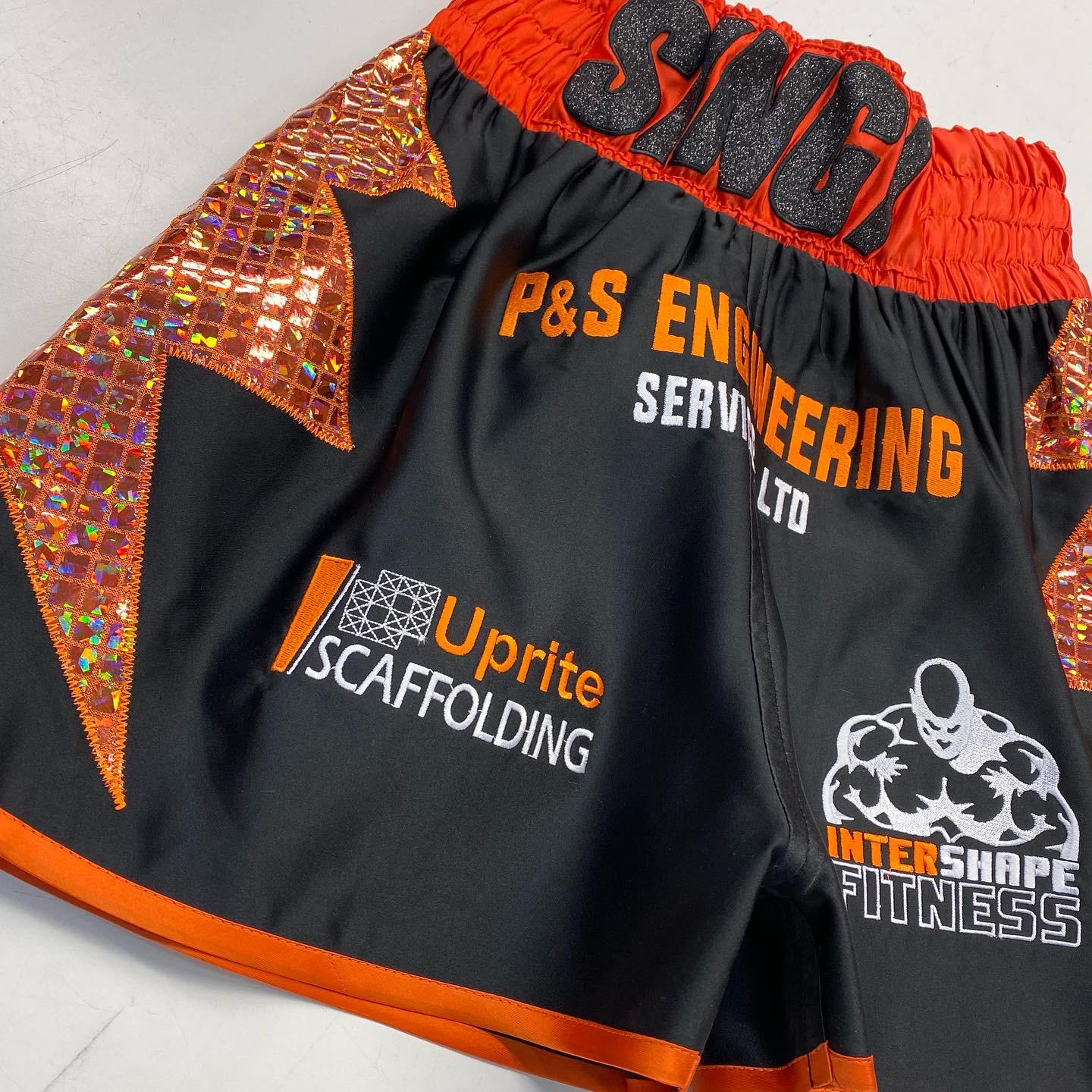 Shane Singleton Orange Lightning Bolt Boxing Shorts